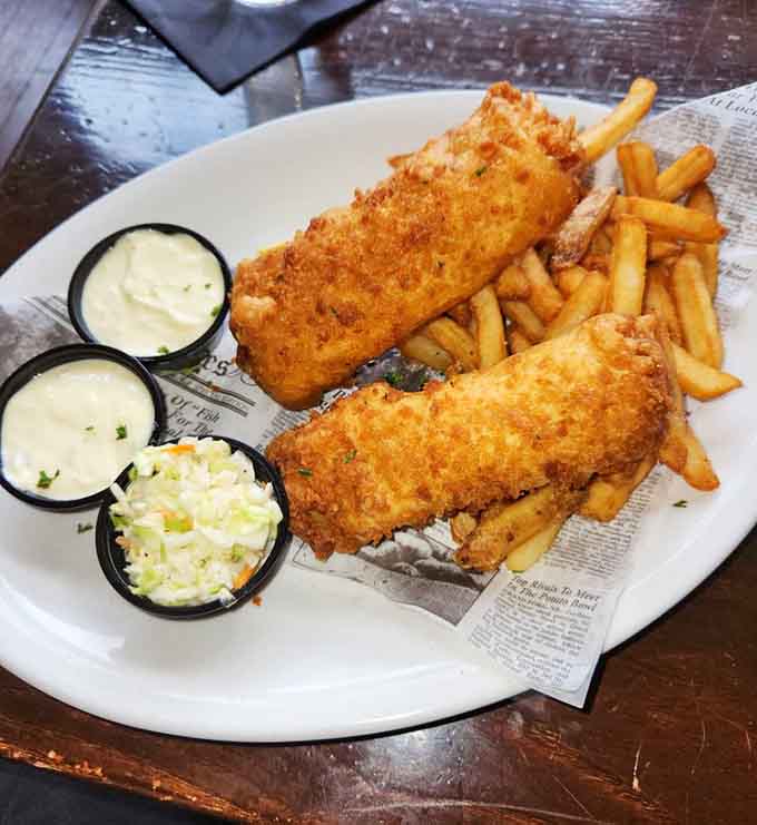 Golden, crispy, beer-battered perfection with fries that could make a grown person weep tears of joy; this is Fish & Chips done absolutely right.
