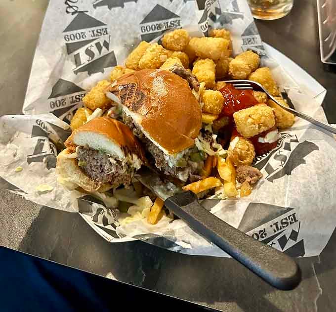 Burgers and tots create a harmony of flavors that would make any comfort food lover weak in the knees.