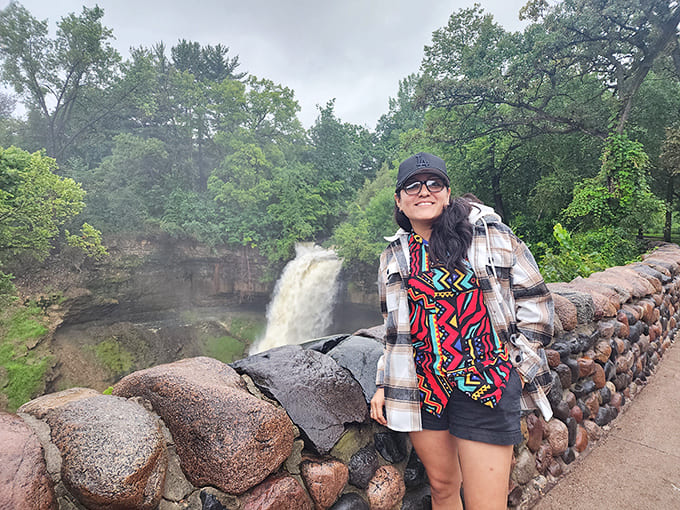 That smile says it all, standing at the overlook of Minnehaha Falls is the kind of experience that makes your face do happy things automatically.