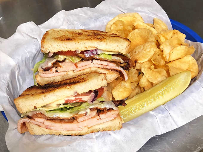 The club sandwich here doesn't just stack ingredients &ndash; it builds flavor architecture worthy of a Scandinavian design award.