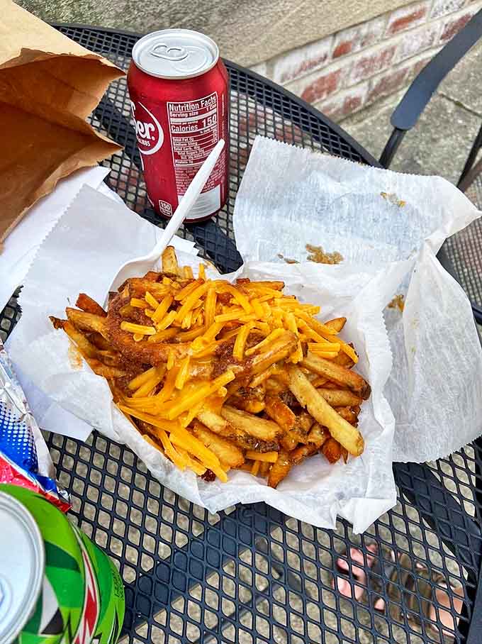 Golden-brown hand-cut fries swimming in rich chili and melted cheddar &ndash; a supporting act so good it frequently steals the show from the headlining hot dogs.