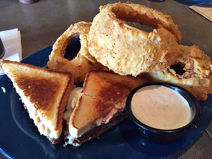 The dynamic duo that's changed more lives than self-help books—crispy rings and a melty sandwich that demands your full attention.
