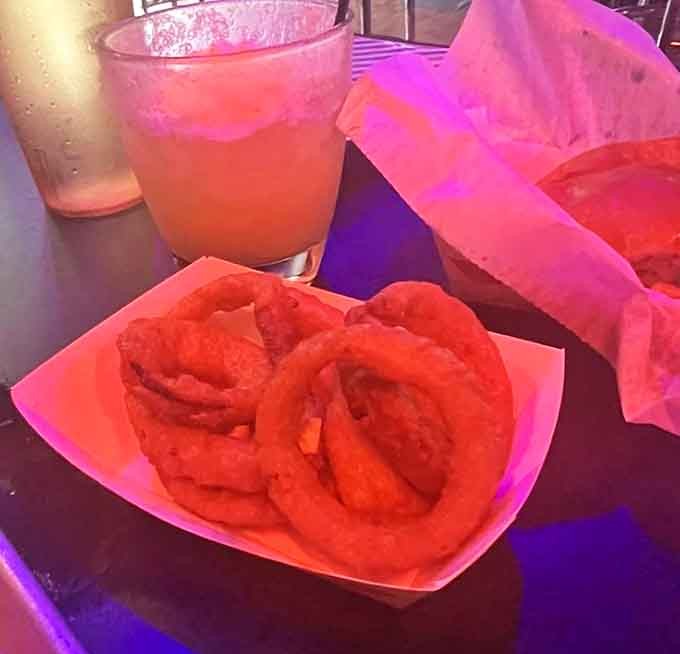 Golden onion rings this perfectly crispy should probably be illegal, or at least require a warning label for addictiveness.