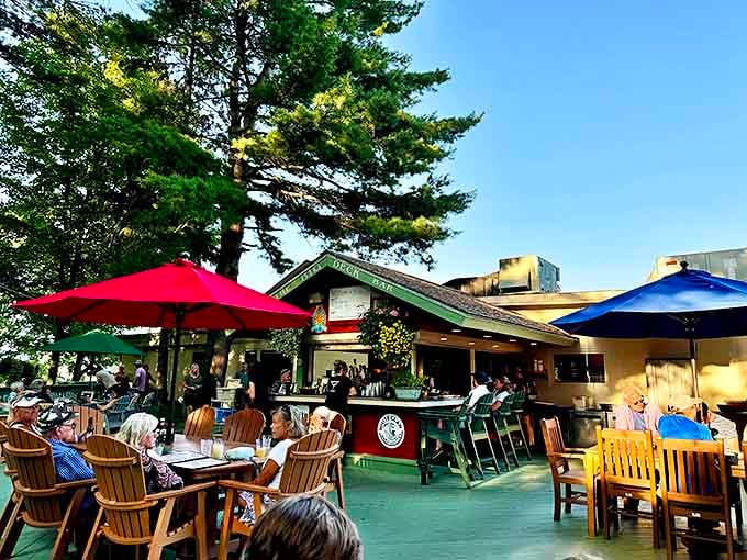 Dine under Michigan's big sky where colorful umbrellas dot the patio like a painter's palette against nature's canvas.
