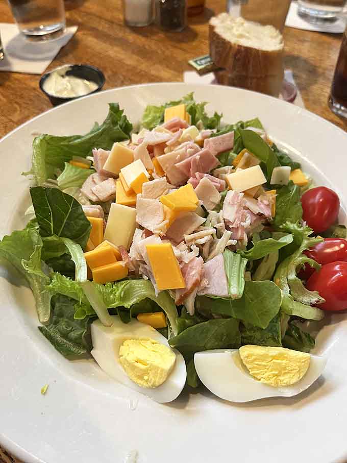 This chef salad brings serious substance with generous portions of turkey, ham, cheese, and eggs atop fresh, crisp greens.