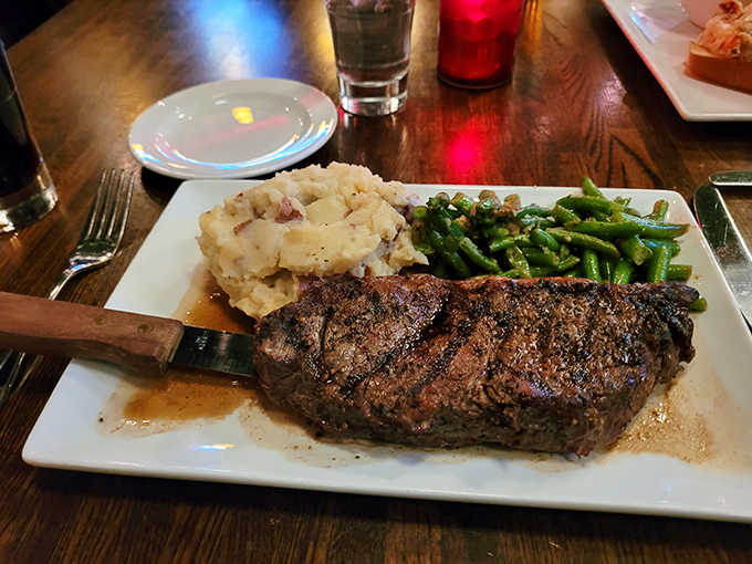 This strip steak isn't just dinner &ndash; it's a masterclass in meat preparation, with a char that would make grill masters weep with joy.