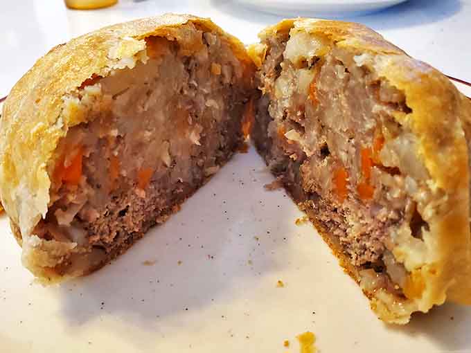 Cut open a Suomi pasty and behold the perfect harmony of meat, potatoes, and vegetables &ndash; architecture you can eat with gravy.