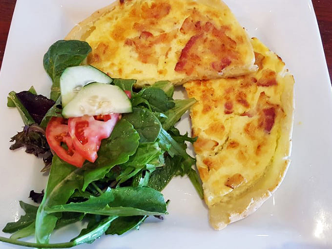 Quiche Lorraine bringing that bacon-and-cheese magic that's been working since someone in France had a brilliant idea centuries ago.