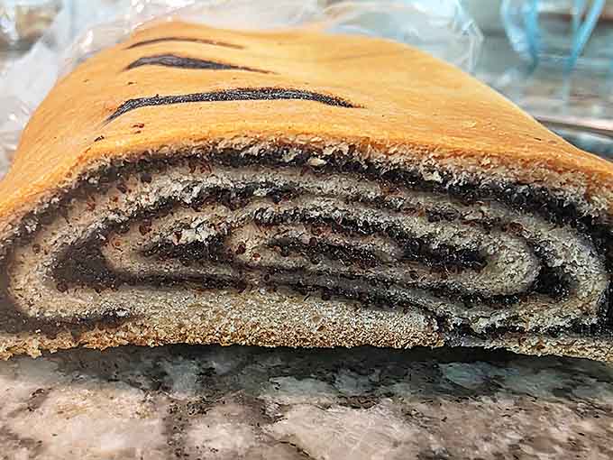 Slice into a poppy seed roll and discover the dark, mysterious filling that's been captivating taste buds for generations.