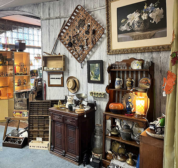 A perfectly arranged vignette of antique furniture and decorative items creates a tableau that could have been lifted straight from a 1940s home.