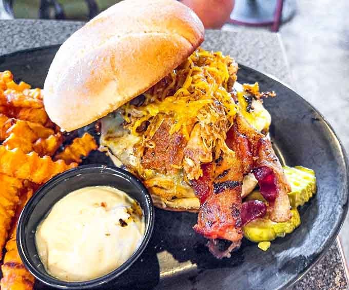 This towering burger situation proves Pub 500 doesn't mess around when it comes to satisfying serious appetites and cravings.