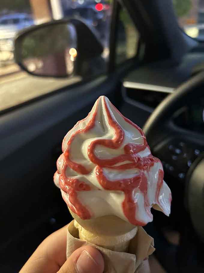 The soft-serve gets the strawberry swirl treatment, creating a frozen masterpiece that's almost too pretty to eat (but you'll eat it anyway).