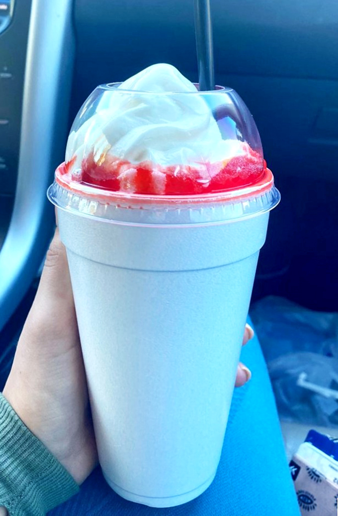 Like drinking a sunset with a cherry kick, this colorful creation offers sweet relief from the Arizona heat.