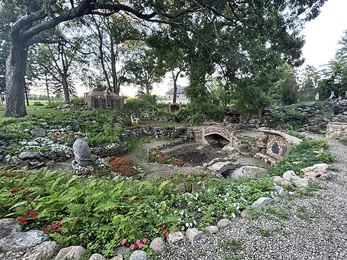 Stone structures nestled among lush greenery create a perfect marriage between human artistry and nature's persistent growth, each element enhancing the other like good neighbors who actually get along.