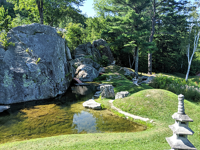 Stone meets water in perfect harmony &ndash; massive boulders emerge from reflective pools like miniature mountains in this Japanese-inspired oasis.