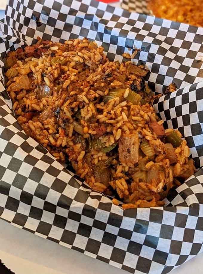 This isn't your average chicken sandwich, it's a towering masterpiece of fried goodness that requires both hands and possibly a strategy.