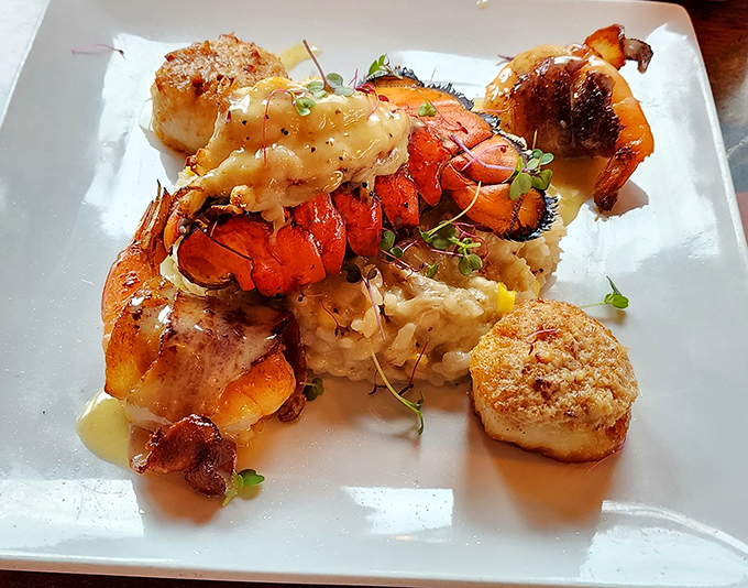 The seafood trio delivers a triple threat of ocean delights: perfectly seared scallops, sweet lobster, and that legendary stuffed shrimp.