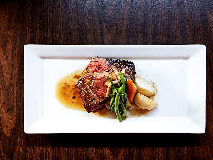 Meat perfection! This succulent steak exemplifies T.J. Buckley's philosophy: exceptional ingredients, treated with respect, need little embellishment to shine.