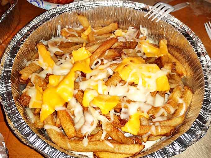 Cheese fries that could make a French culinary school graduate weep with joy &ndash; crispy, gooey, and utterly irresistible.
