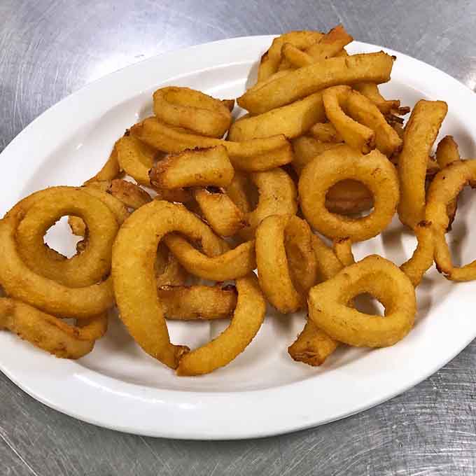 These golden rings of crispy perfection prove that sometimes the simplest pleasures are the most satisfying ones.