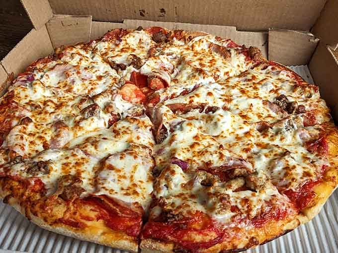 When you need serious meat on your pizza, this generously topped pie delivers with perfectly seasoned sausage and pepperoni in every bite.