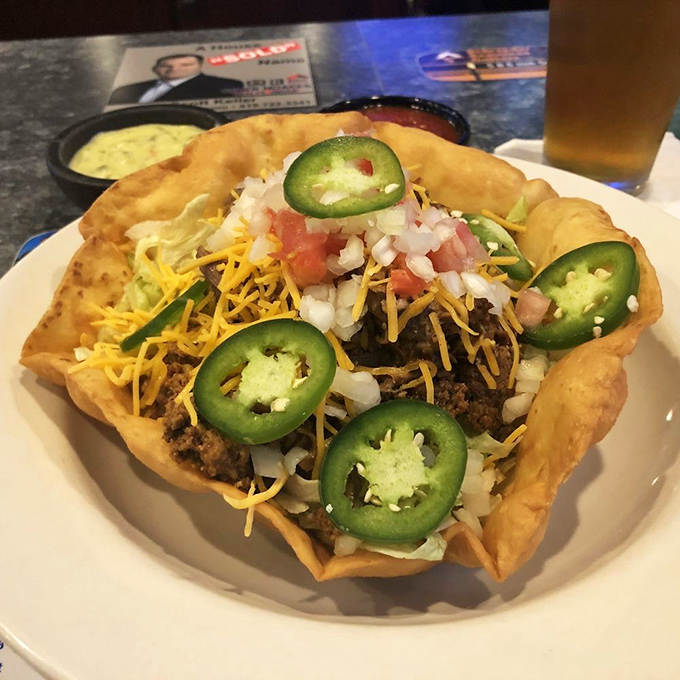 Taco Salad A fiesta in a crispy tortilla bowl, where seasoned beef meets fresh toppings and those vibrant jalape&ntilde;os add just enough kick.