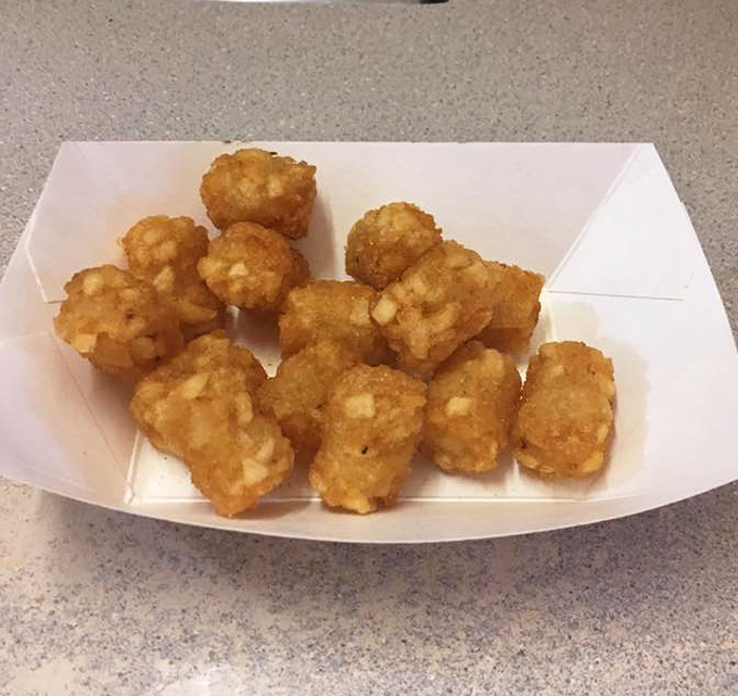 Golden, crispy tater tots that shatter with each bite &ndash; proof that sometimes the simplest pleasures are the most satisfying.