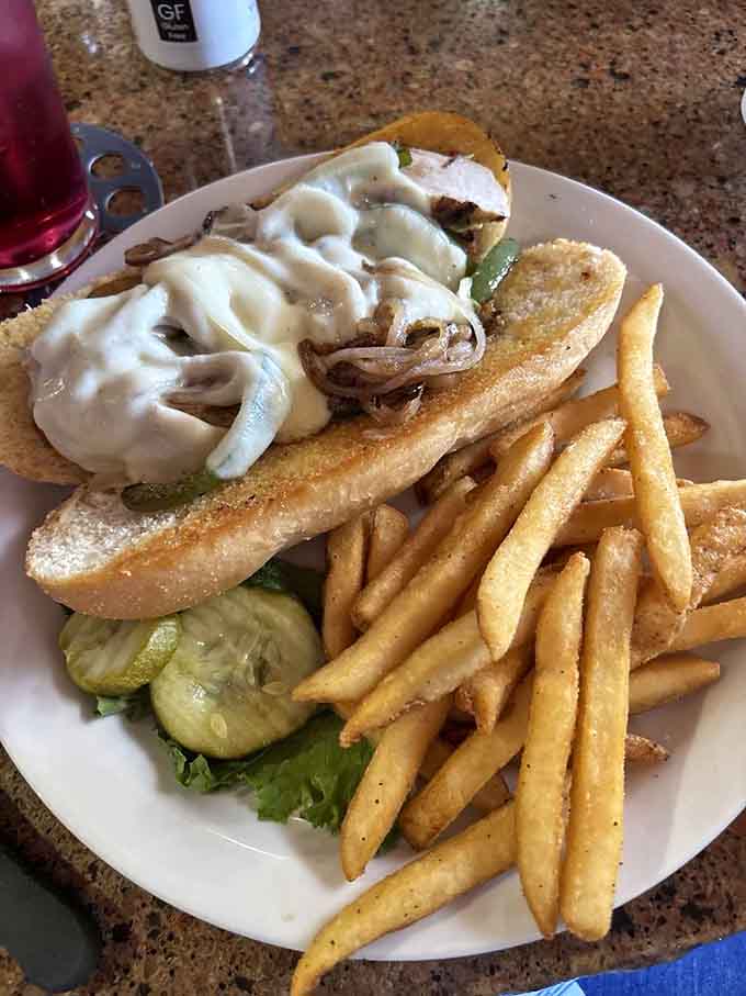 The Chicken Philly proves this kitchen's talents extend beyond beef, with melted cheese cascading over tender chicken.