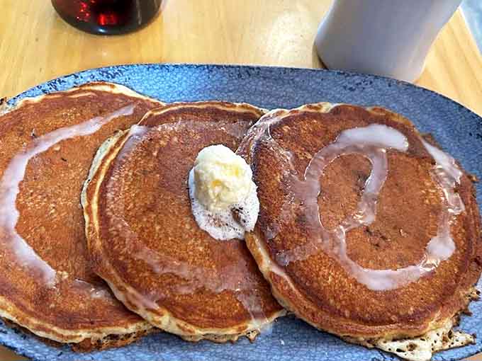 Golden pancakes stacked high with butter melting down the sides, because sometimes the classics become classics for very good reasons.