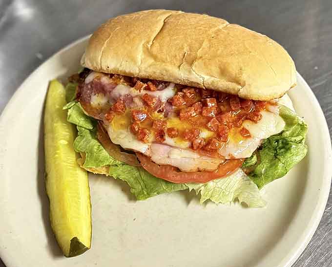 Behold the breakfast sandwich in all its glory, where crispy bacon meets fluffy eggs on a bun that knows its purpose.