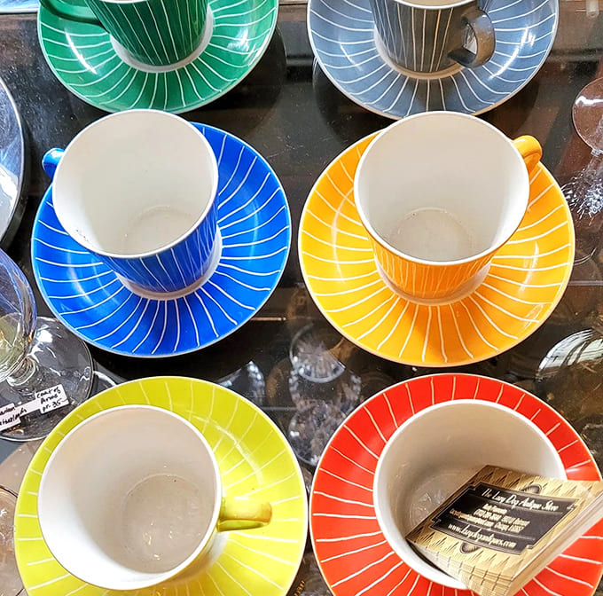 Rainbow teacups that prove drinking beverages should be a colorful celebration, not a beige experience with boring white china.