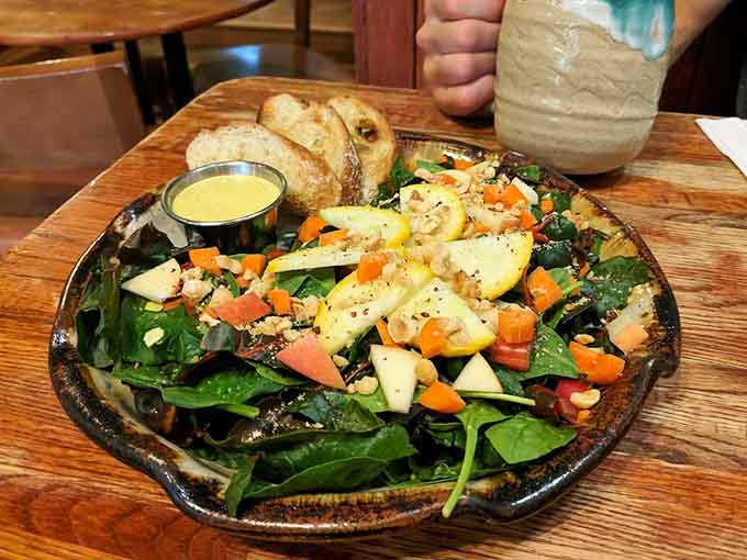 Fresh vegetables and greens arranged on a plate prove that healthy eating doesn't have to mean sacrificing flavor or satisfaction.