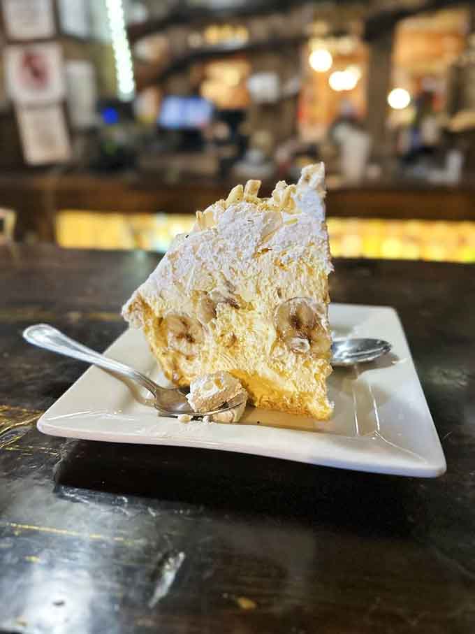 Banana cream pie with towering meringue proves dessert here is just as serious as the main course.