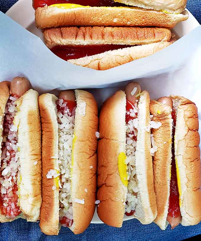 Simple perfection on a bun &ndash; hot dogs topped with diced onions and that signature homemade chili that keeps Kalamazoo coming back decade after decade.