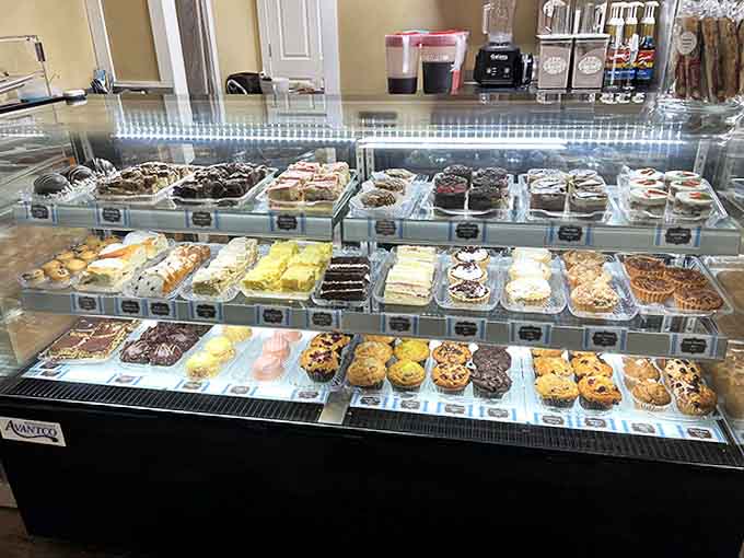 The pastry case: where willpower goes to die and breakfast plans are gloriously ruined by buttery, flaky perfection.