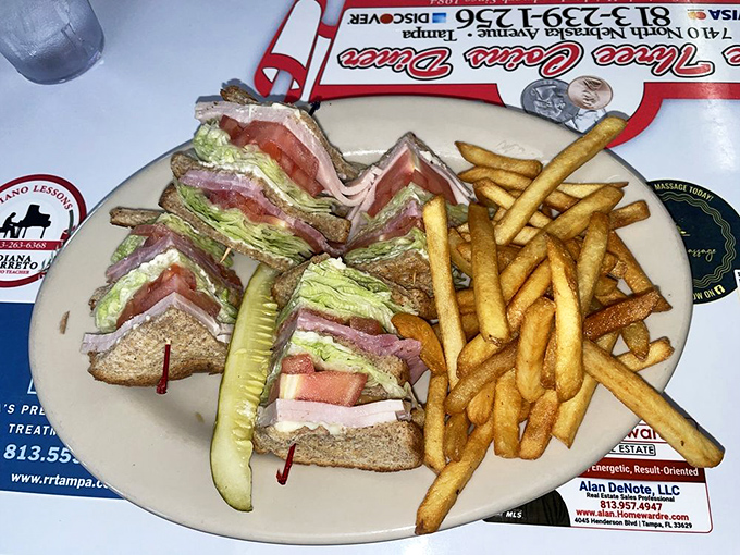 The club sandwich &ndash; a towering achievement in lunch architecture that requires both hands and possibly an engineering degree.