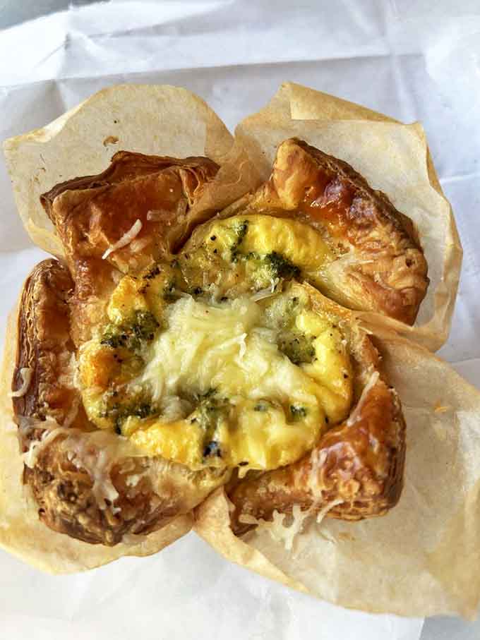 A golden-brown masterpiece where vegetables find their higher purpose nestled in a custard that defies physics with its perfect texture.