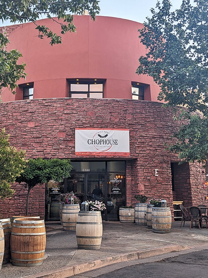 Village Chophouse welcomes hungry adventurers with rustic stone walls and wooden barrels, promising steaks that rival the size of the surrounding buttes.