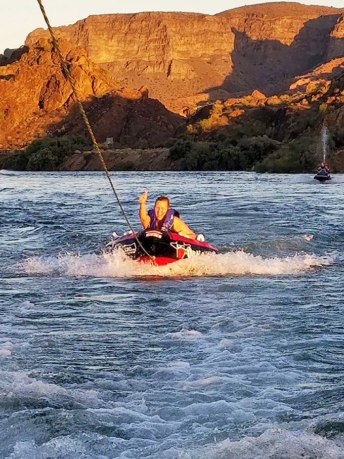 Adrenaline meets refreshment as water enthusiasts carve through the Colorado's currents, creating ripples an in equal measure.