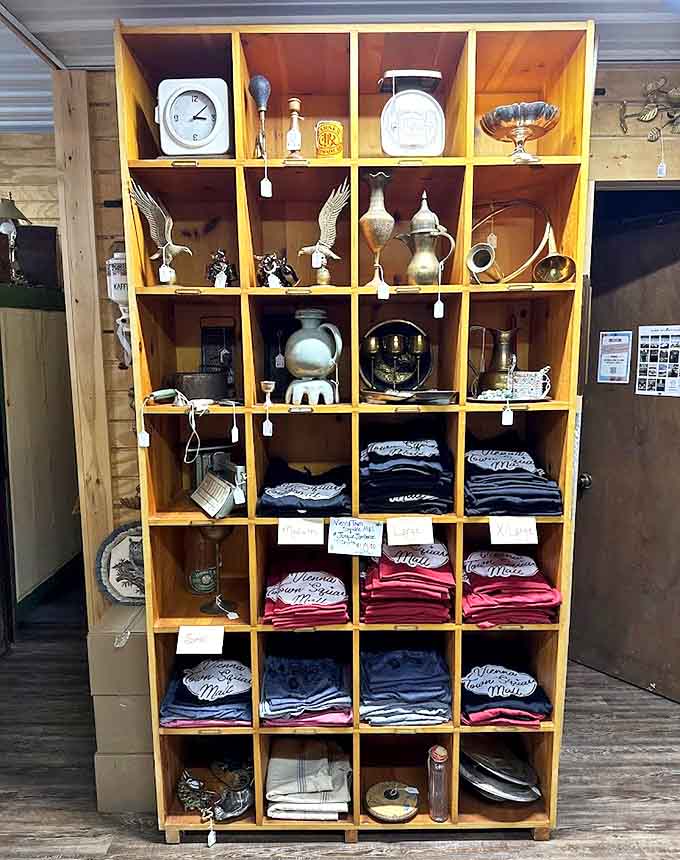 Like a honeycomb of history, each compartment holds its own sweet surprise &ndash; from brass eagles to vintage timepieces.