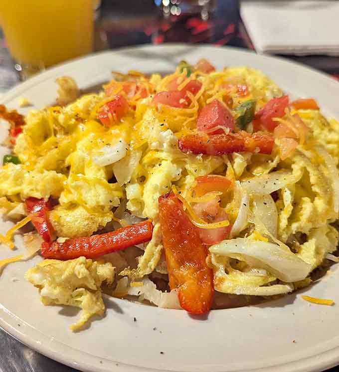 This garden breakfast bowl proves vegetables can absolutely belong at breakfast when they're surrounded by eggs, cheese, and all the good stuff.