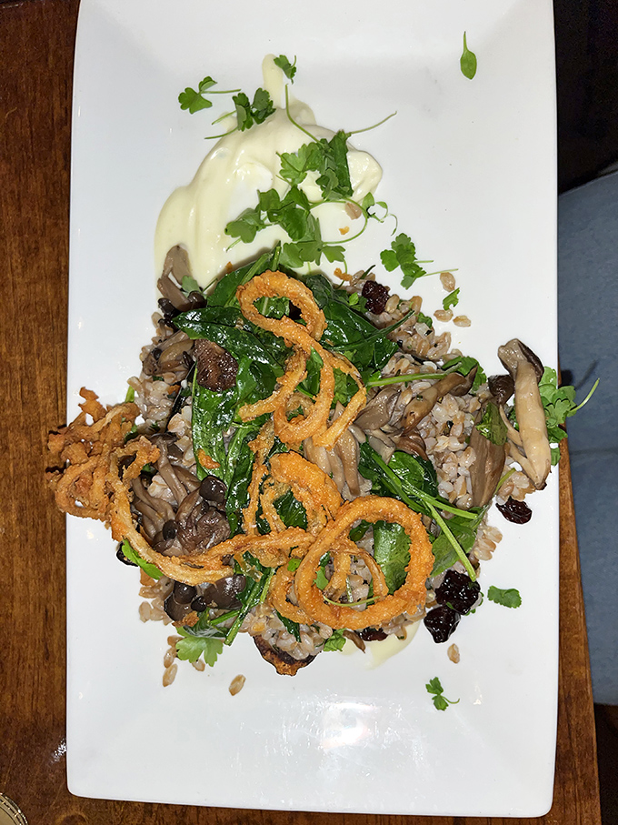 Not just vegetarian comfort food&mdash;this acorn squash dish with wild rice and seasonal vegetables converts even dedicated carnivores with every flavorful forkful.