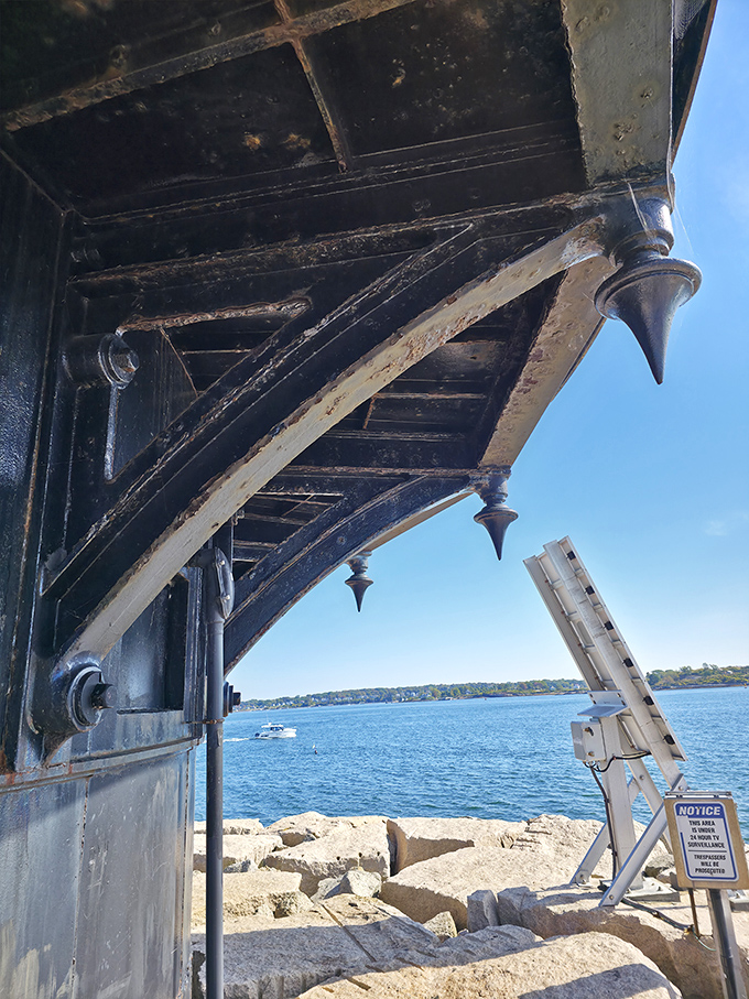 Architectural details reveal the lighthouse's sturdy construction, designed to withstand decades of punishing Atlantic storms and sea spray.