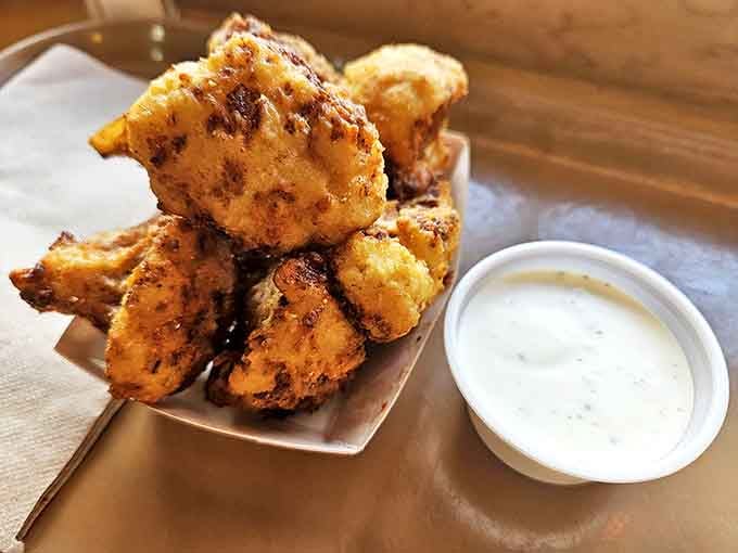 Who knew cauliflower could be this exciting? Crispy, golden bites that convert vegetable skeptics daily, served with creamy dipping sauce for maximum enjoyment.