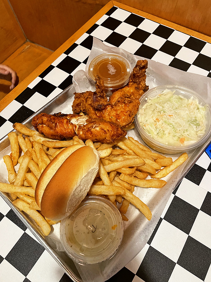 Crispy, golden chicken tenders nestled beside hand-cut fries &ndash; comfort food elevated beyond the ordinary by people who clearly care about every detail.