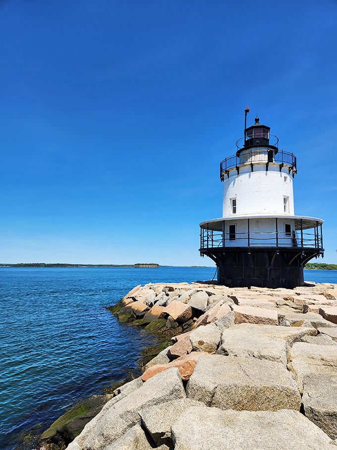 Up close with the lighthouse's gleaming white exterior, where every detail tells a story of maritime engineering excellence.