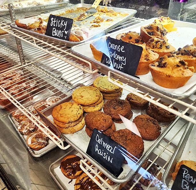 The bakery case is a dangerous place for willpower – sticky buns glisten, cookies beckon, and those orange cranberry walnut muffins have their own fan club.
