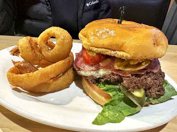 A proper American burger that requires both hands and possibly a bib. Paired with those famous onion rings, it's a combo that could make a vegetarian reconsider.