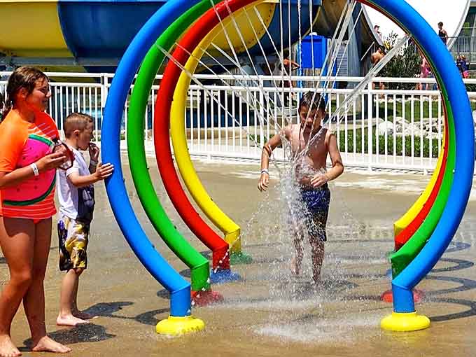 Nothing says "childhood summer" like the pure joy of running through water sprays, where getting soaked isn't just allowed &ndash; it's the whole point!