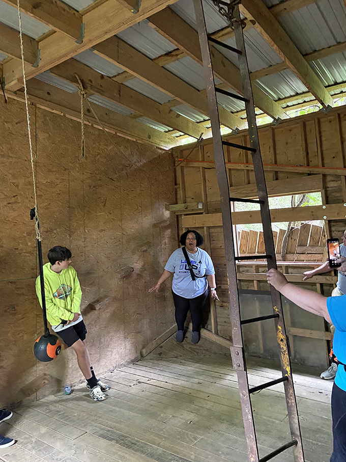 This rustic wooden structure might look like a simple cabin, but inside awaits challenges that'll test your courage and possibly your upper body strength.